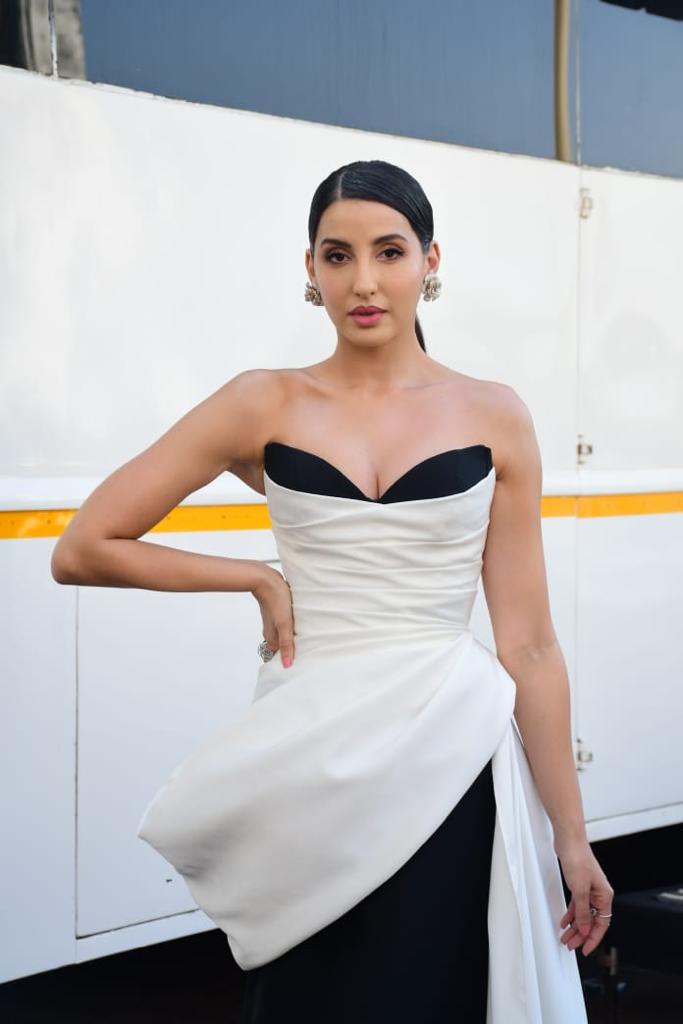 Nora Fatehi Makes Heads Turn In Black And White Floor-Sweeping Gown ...