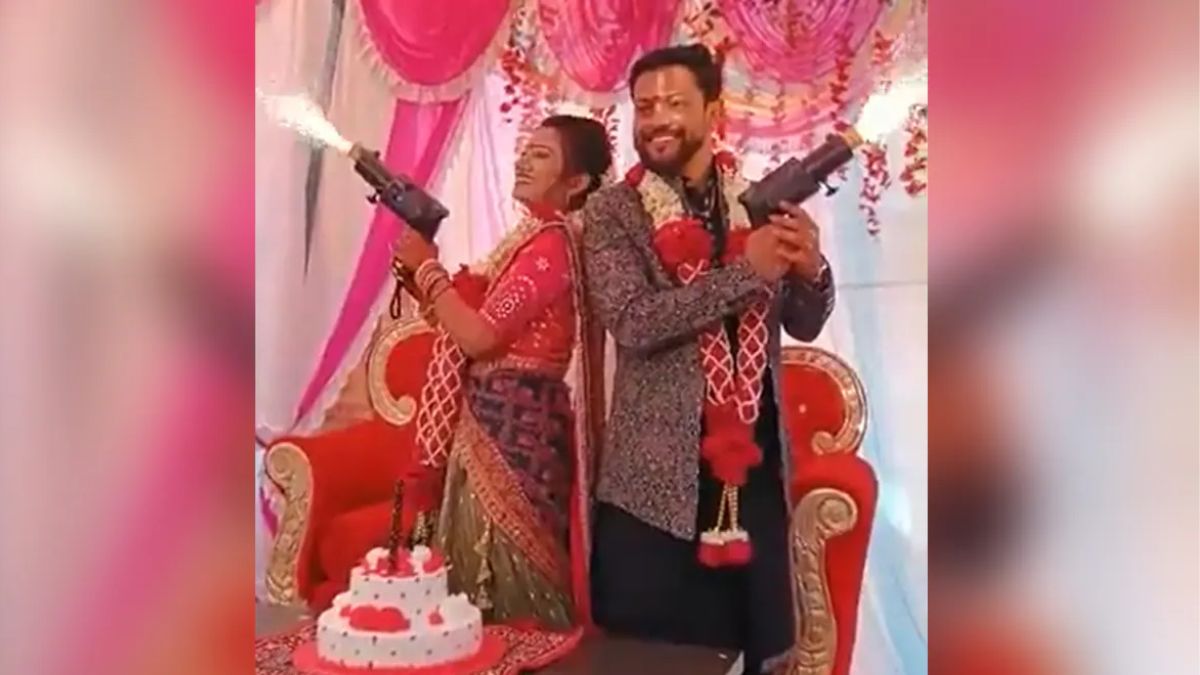 Sparkling Gun Blows Up In Bride's Face As Couple Pose For Camera | Watch