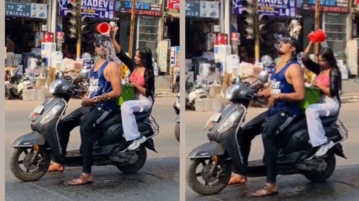 Viral Video: Man And Woman Take Bath While Riding Scooty; Police Initiate Action