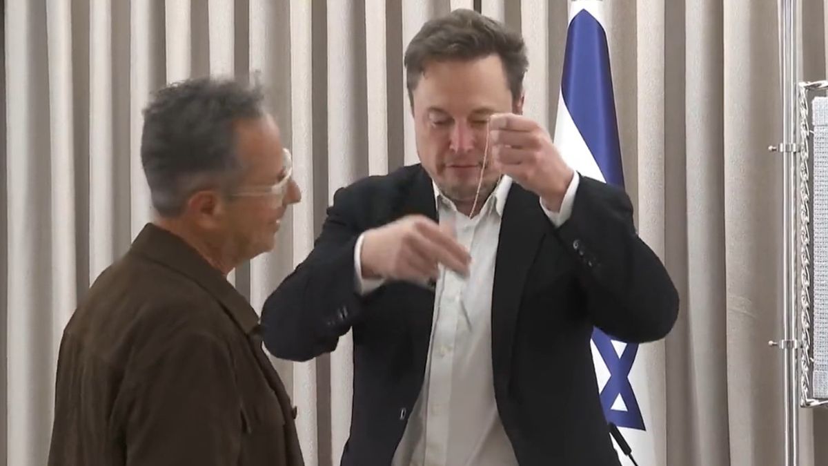 Elon Musk Gets Symbolic Dog Tag From Israeli Hostage’s Father, Promises ...