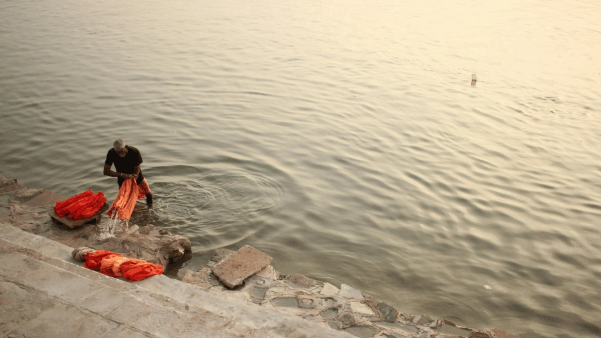 Viral Video: Men Allegedly Drinking Alcohol Near River Ganga Get Beaten ...