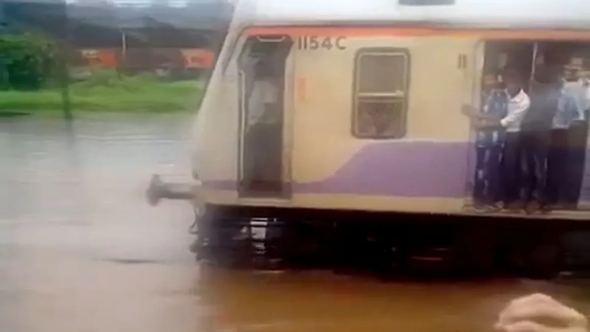 Mumbai Local Train Passes Through Waterlogged Tracks, Netizens Ask Is ...