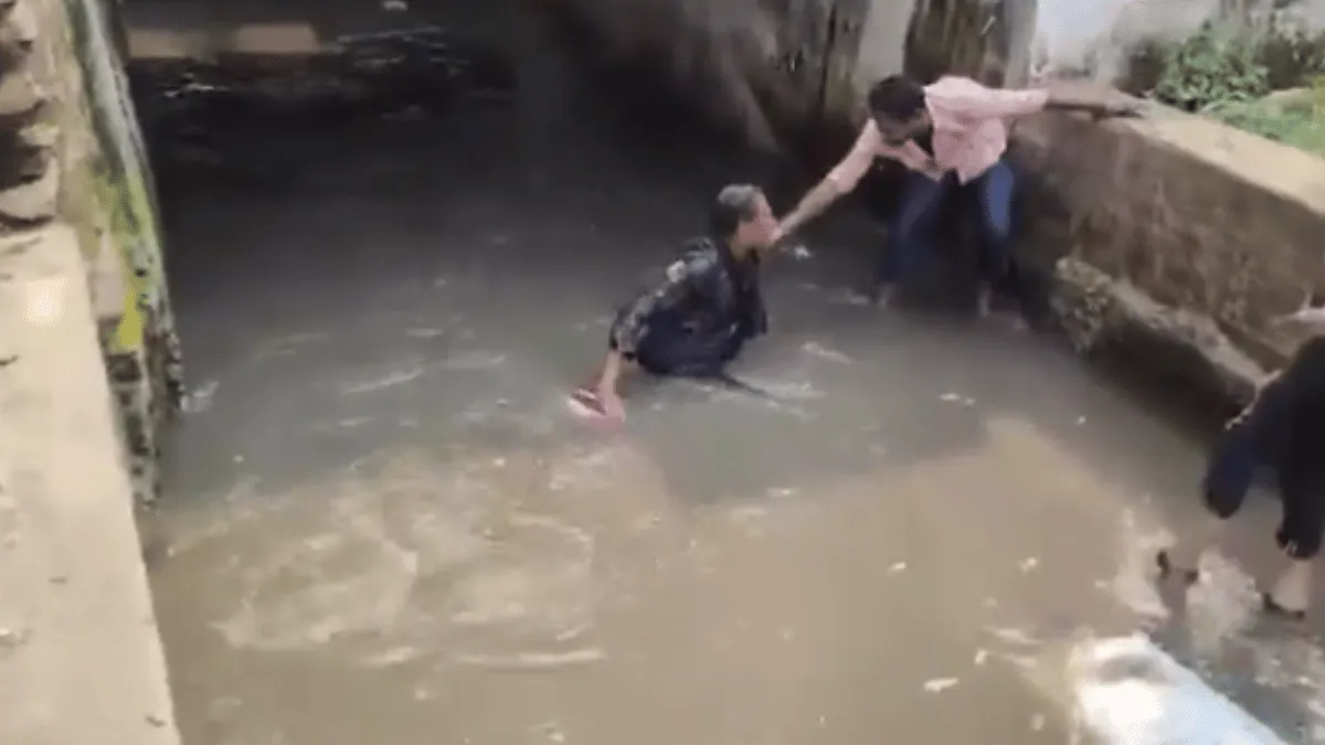 Viral Video: Bike Rider Crossing Submerged Road Under Bridge Fails ...